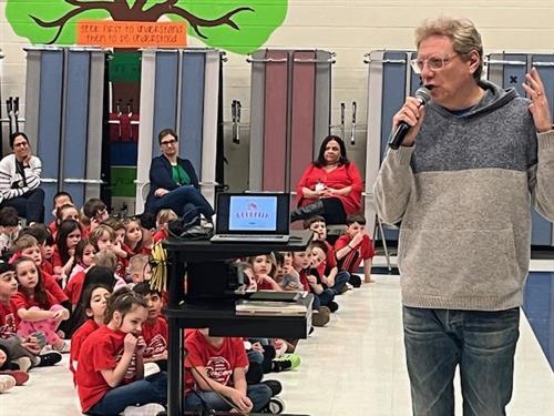 Retired news anchor shares his love of stories with students